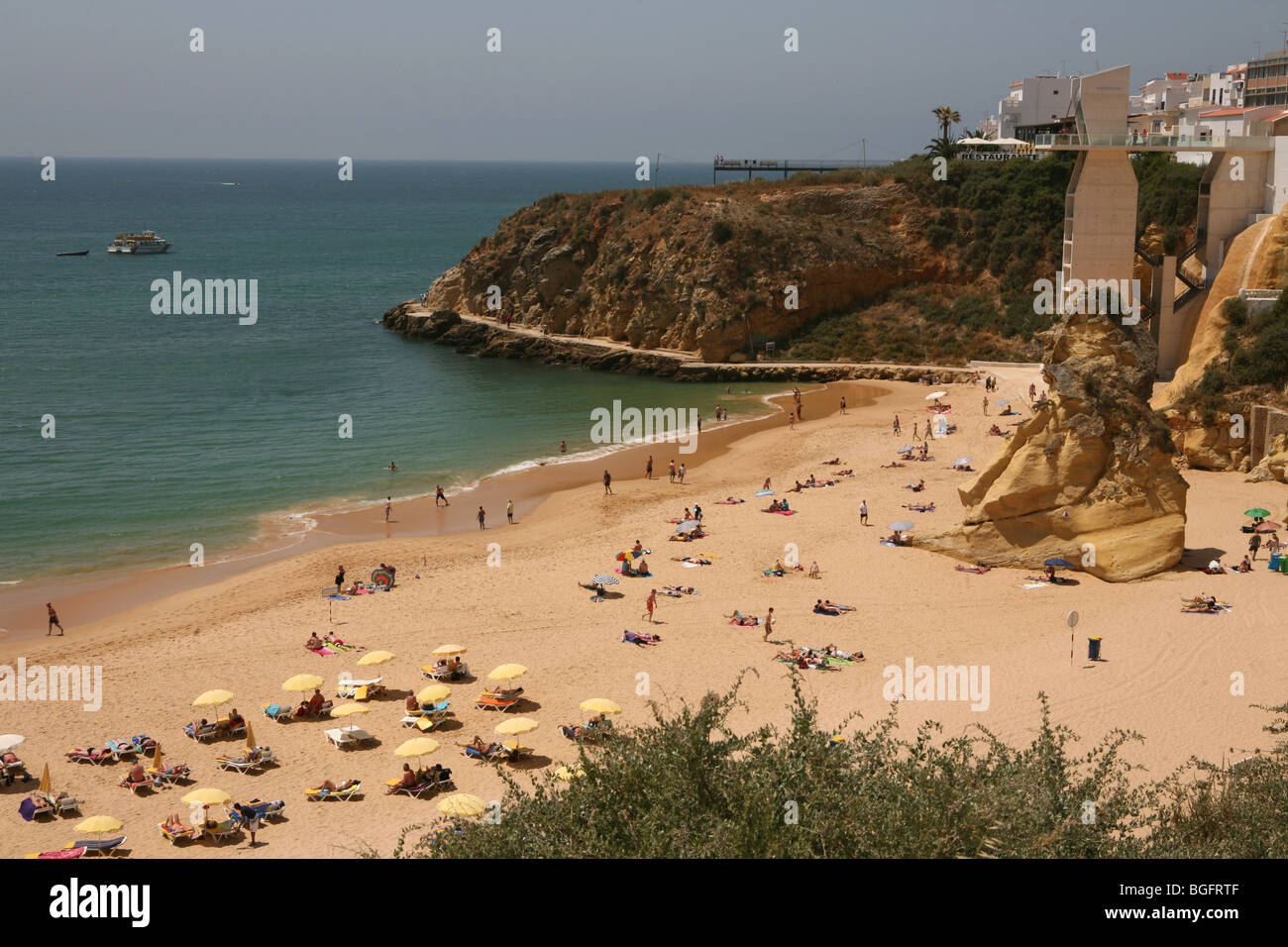 scenes of the algarve in portugal with bright sunny landscapes of ...