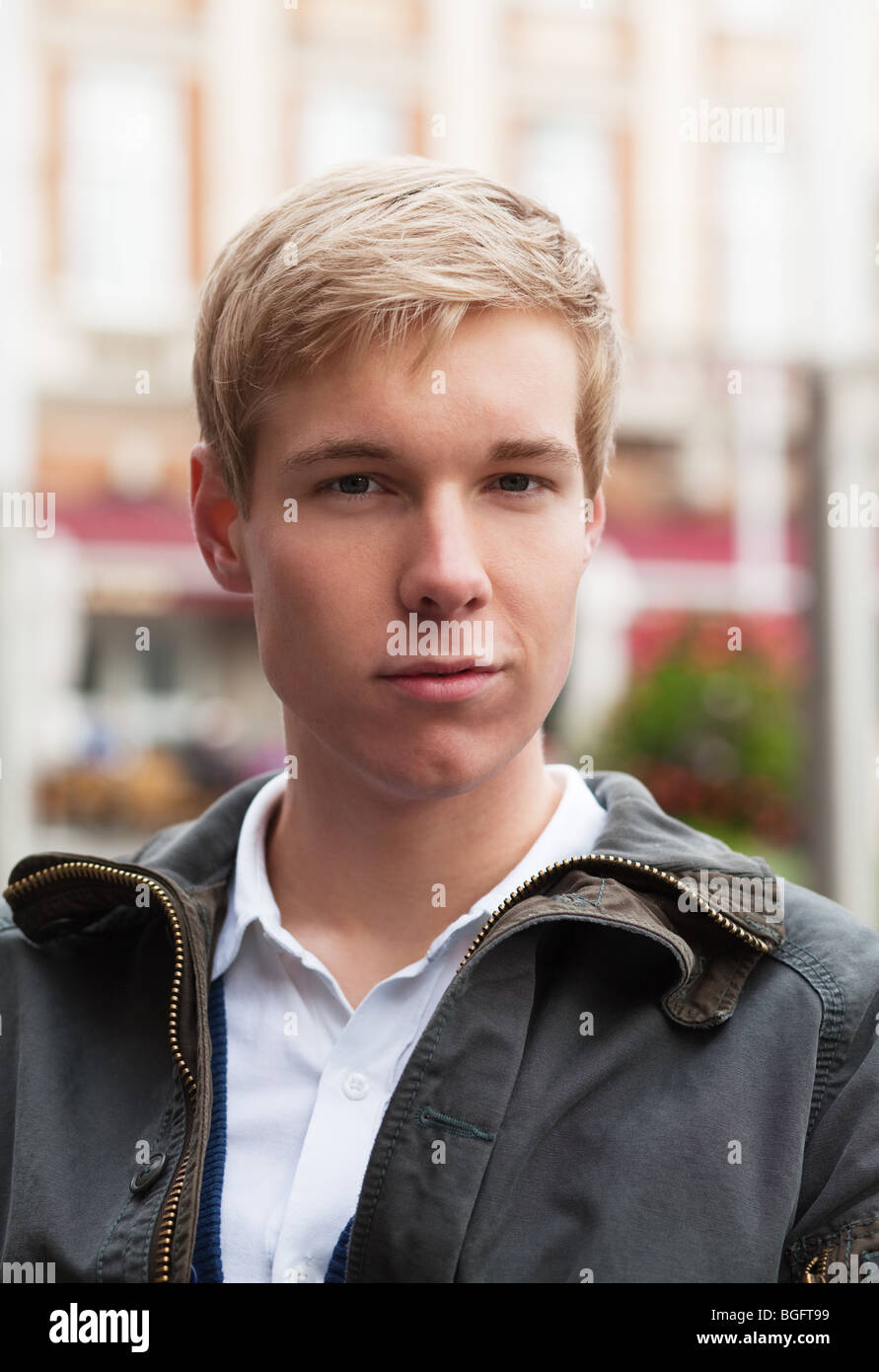 Outdoor portrait of handsome blond young man Stock Photo - Alamy