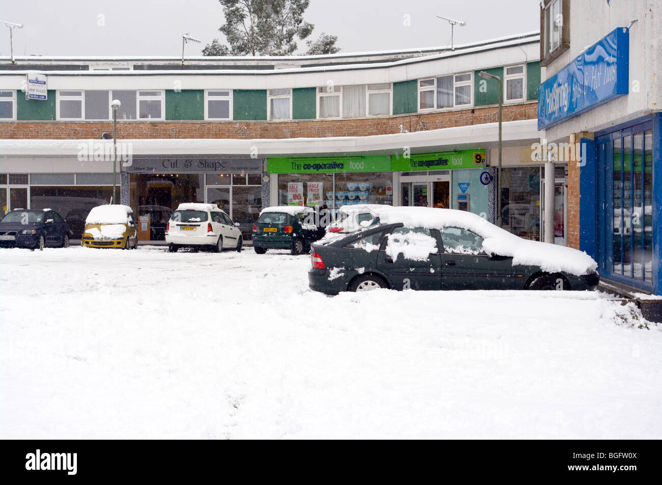 Local Shops Open For Business During Heavy Snowfall Stock Photo - Alamy