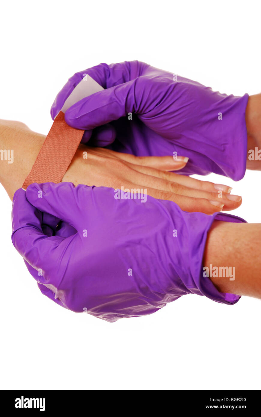 Applying a plaster Stock Photo - Alamy