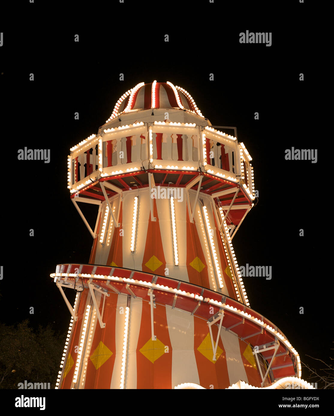 Helter Skelter slide against a dark night sky Stock Photo - Alamy