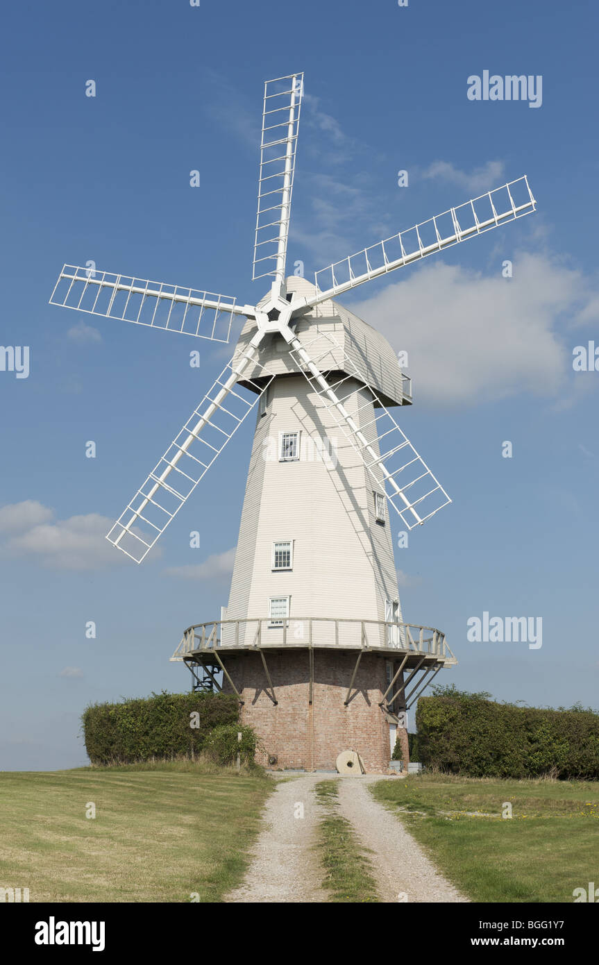 White windmill against a blue sky Stock Photo - Alamy