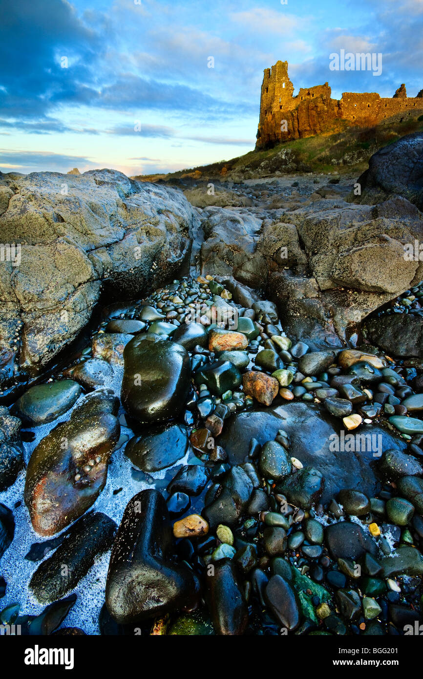 Dunure castle viewed from beach at sunset Stock Photo - Alamy