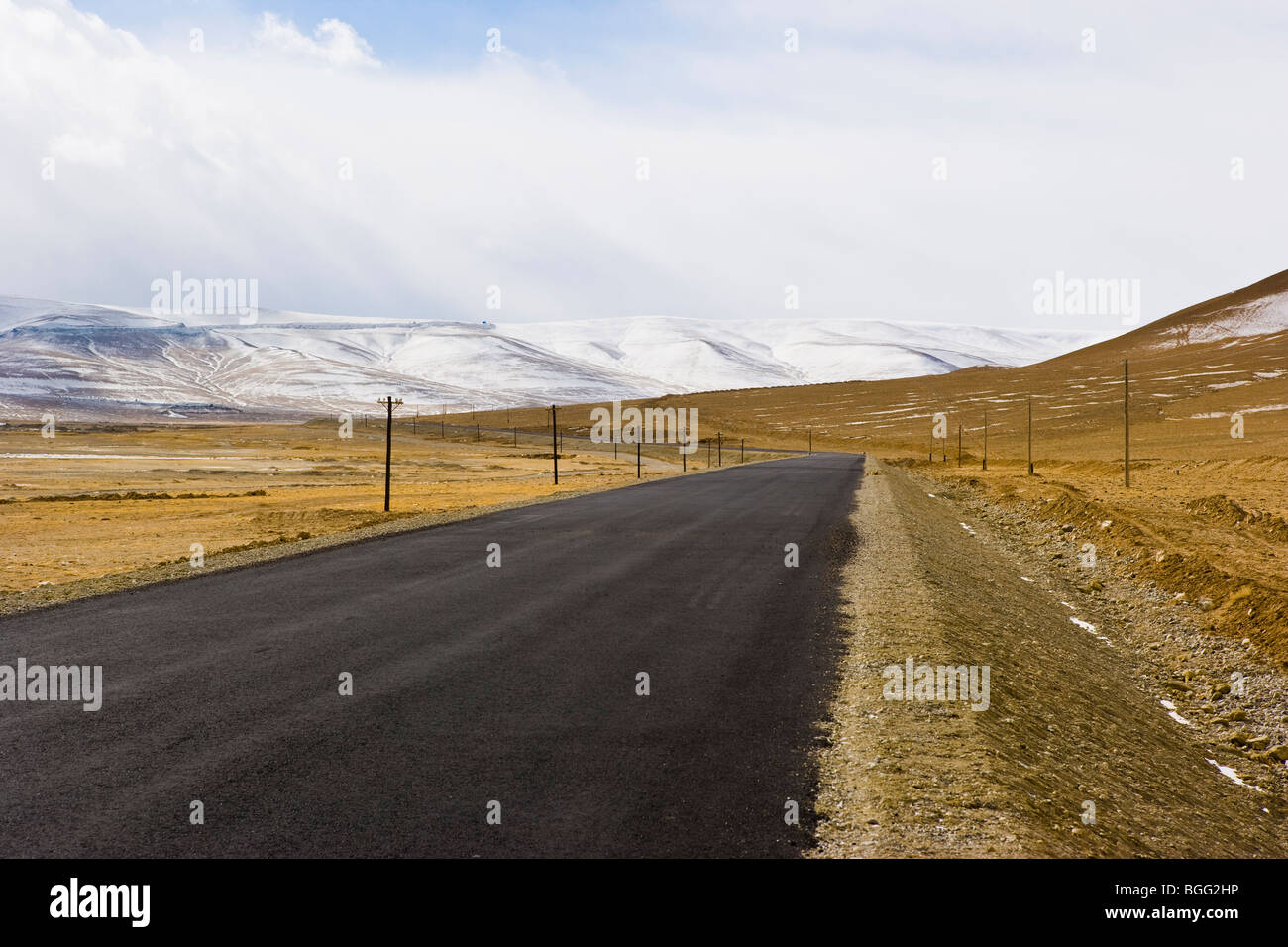 Deserted country road with electric posts, Tashkurgan County, Xinjiang ...