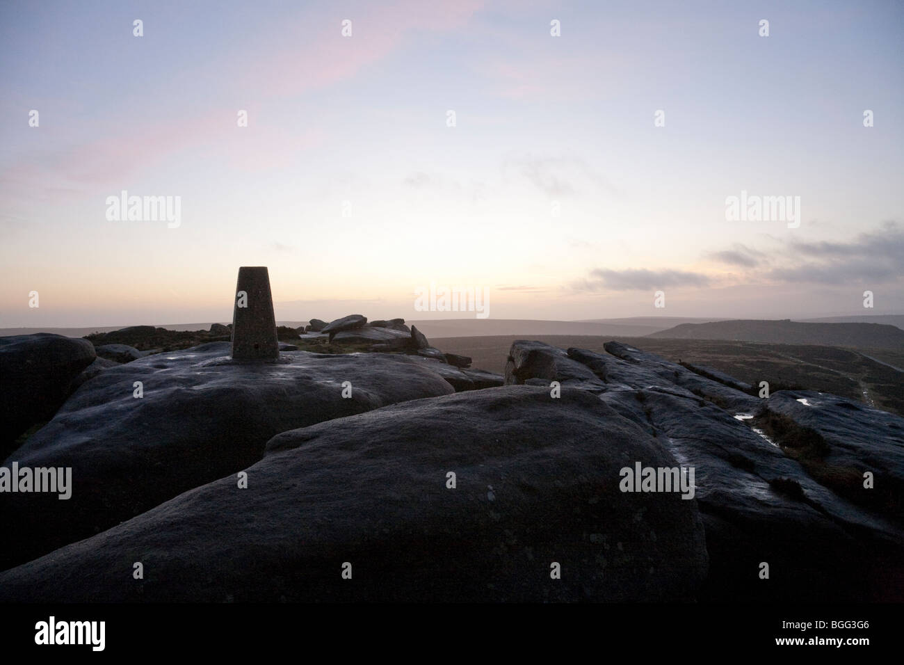 The trig point on Stanage Edge Derbyshire taken at dawn in winter Stock ...