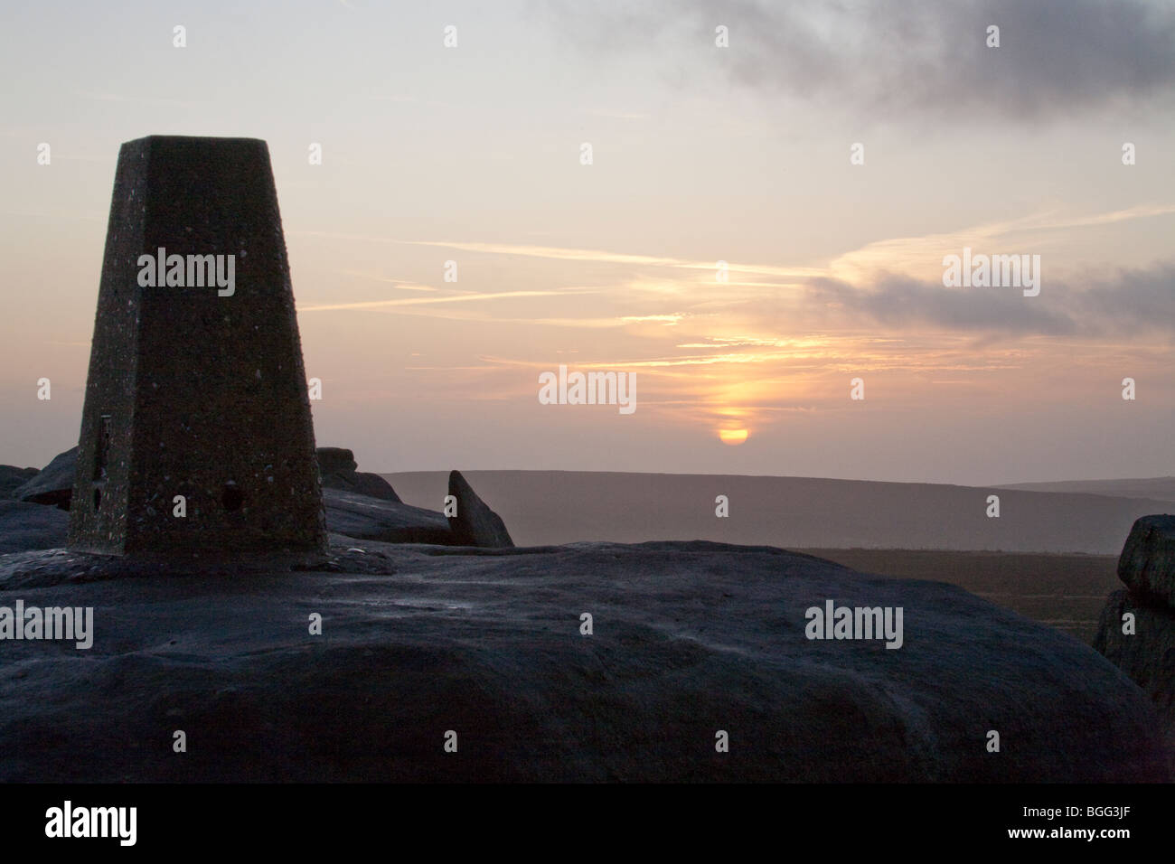 The trig point on Stanage Edge Derbyshire taken at dawn in winter Stock ...