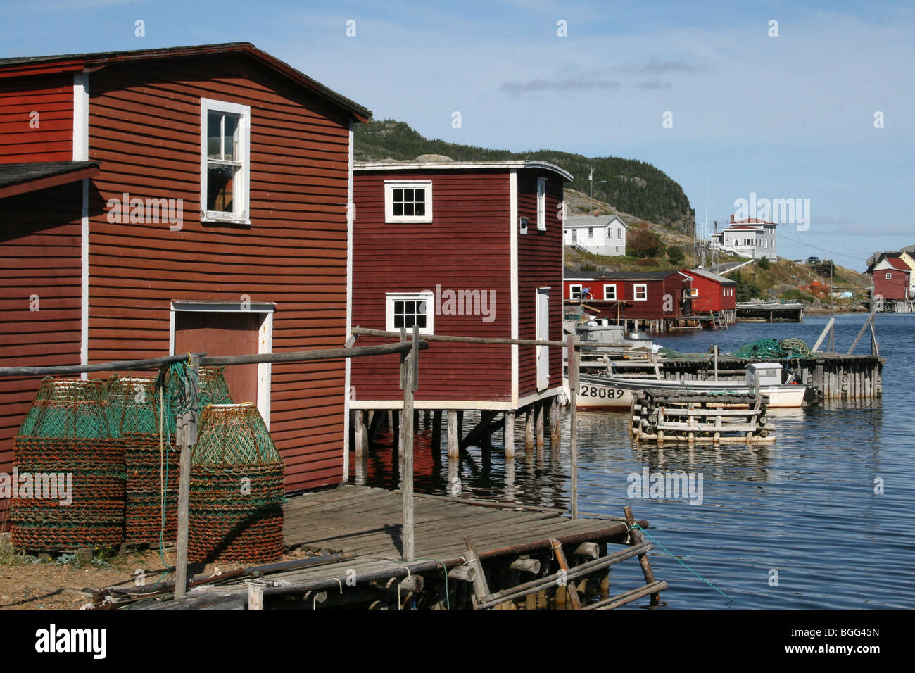 An old fishing village comprised of colorful wooden sheds perched along ...