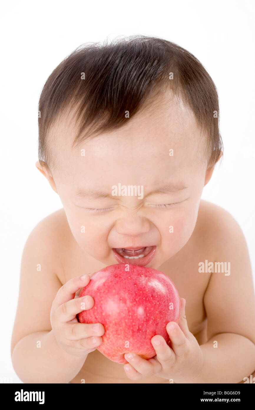 Cute baby boy apple fruit hi-res stock photography and images - Alamy