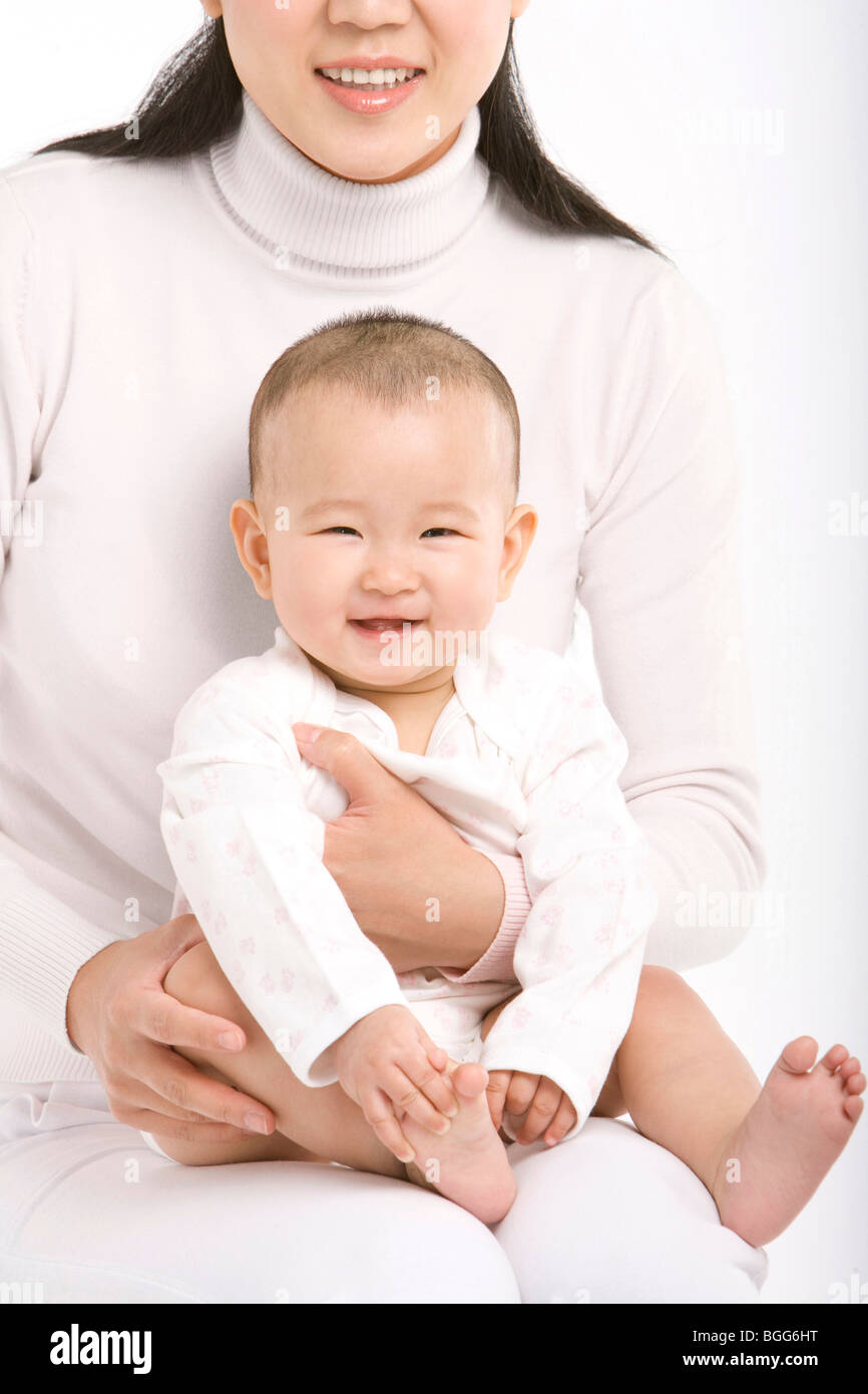 Mother and infant Stock Photo - Alamy