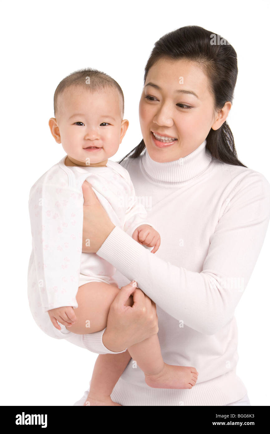 Mother and infant Stock Photo - Alamy