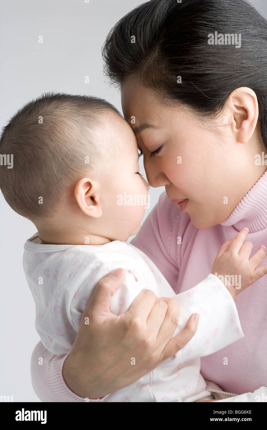 Mother and infant Stock Photo - Alamy