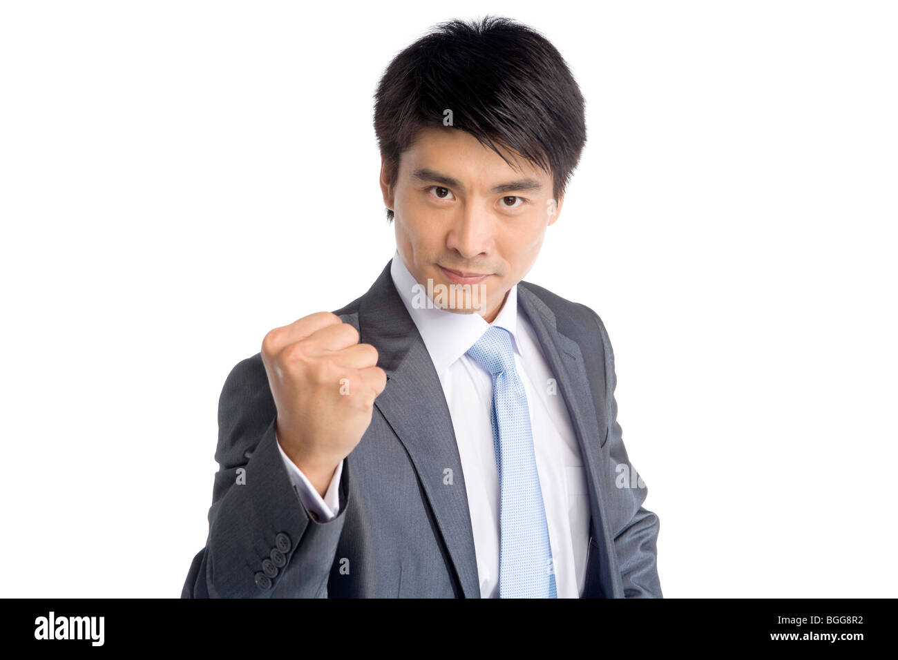 Young Businessman celebrating success with a fist pump Stock Photo - Alamy
