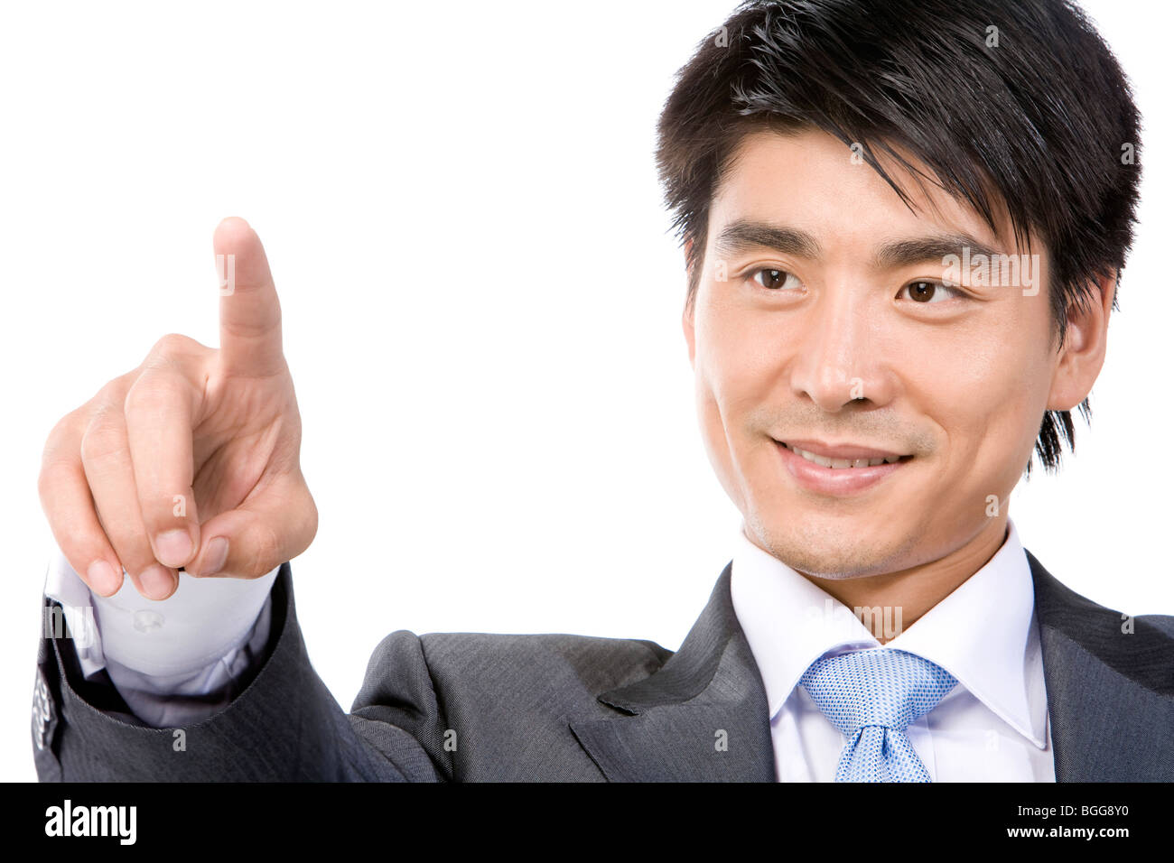 Young Businessman pointing by finger Stock Photo - Alamy