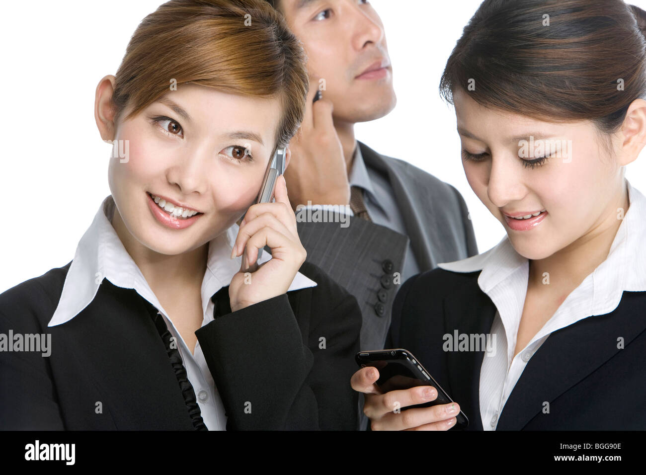Businessmen using cell phones Stock Photo - Alamy