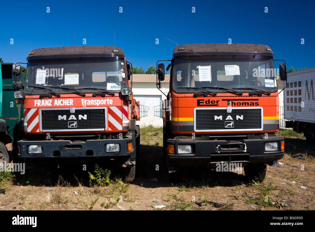 MAN lorries for sale on Atlantic Road, The Gambia Africa Stock Photo ...