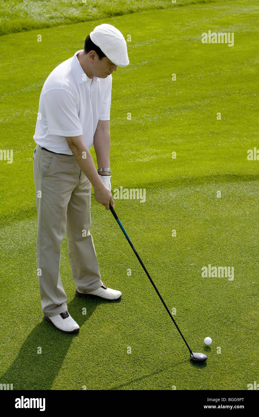 Golfer Teeing Off High Resolution Stock Photography and Images - Alamy