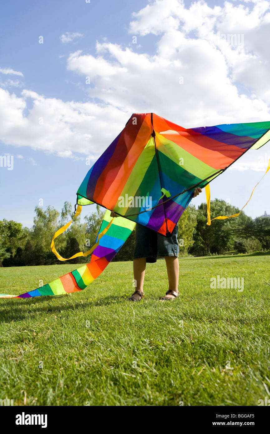 Young boy with kite Stock Photo - Alamy