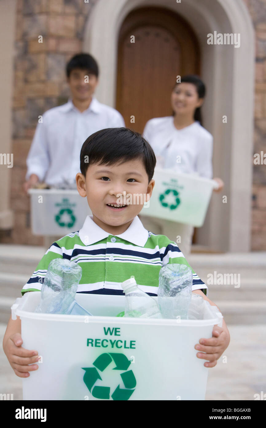 Family doing recycling Stock Photo - Alamy