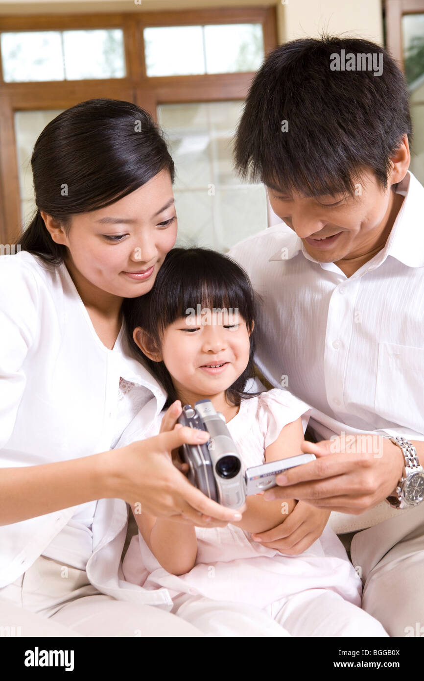Family using digital video camera Stock Photo - Alamy