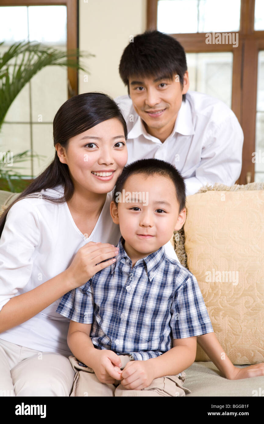 Portrait of a family of three Stock Photo - Alamy