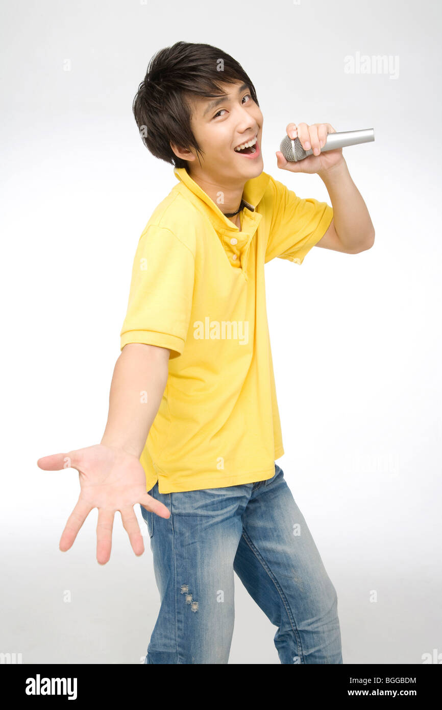 Young carefree singing songs hi-res stock photography and images - Alamy