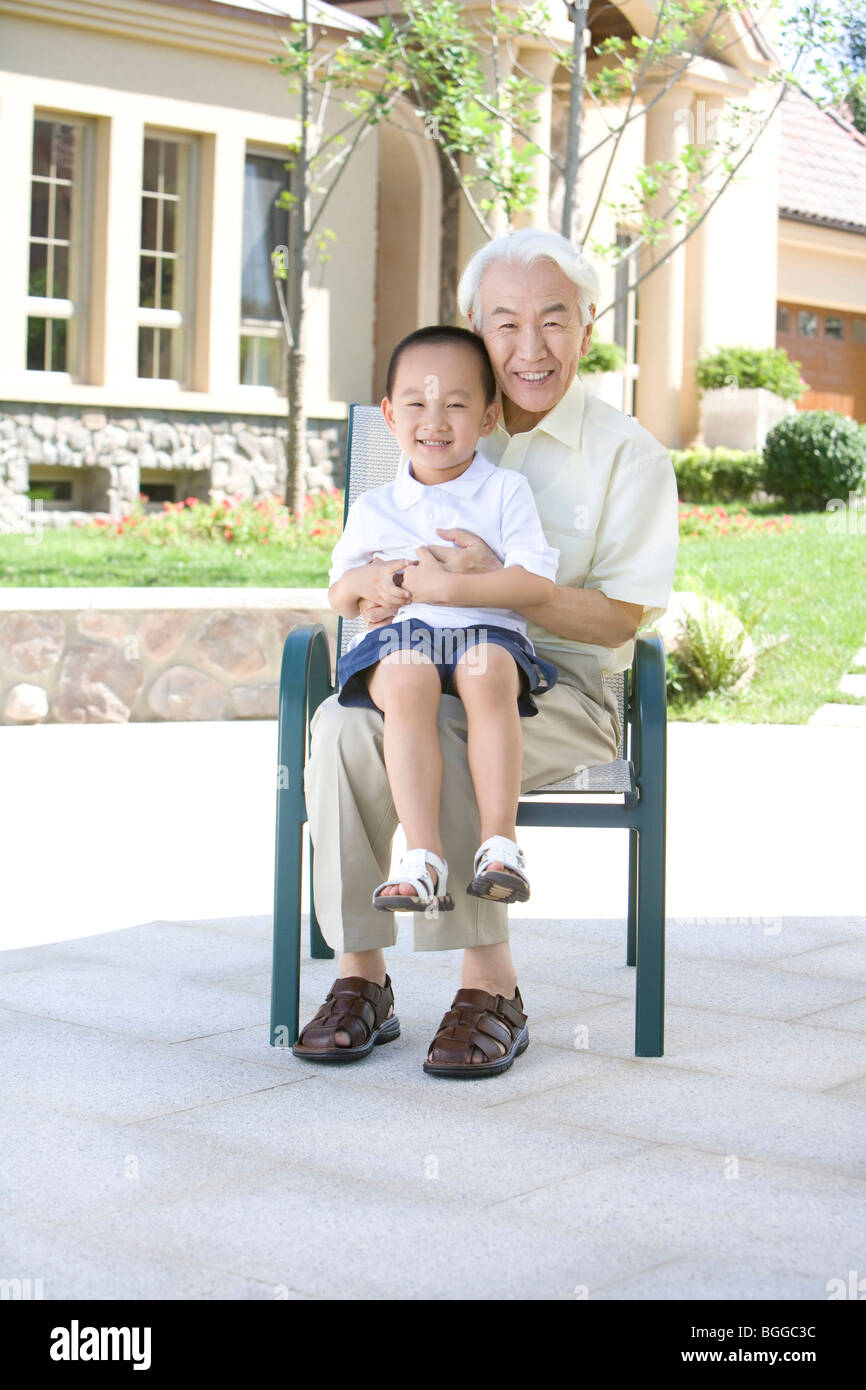 Portrait of grandfather and grandson Stock Photo - Alamy