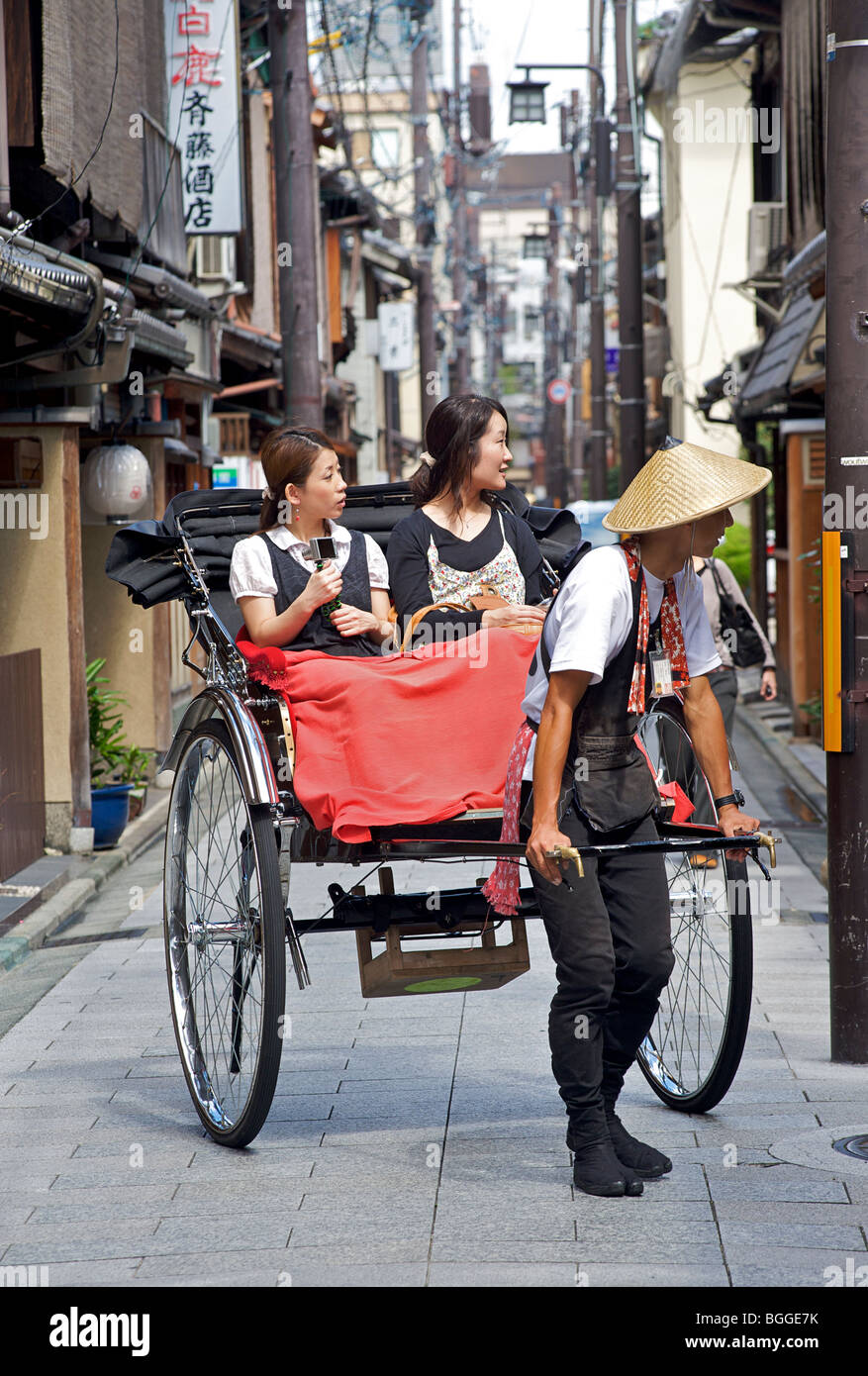 Rickshaw and passengers, Kyoto, Japan Stock Photo - Alamy
