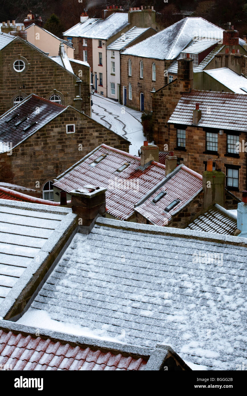 Winter weather & snow covered roofs. The snow covered tiled red ...