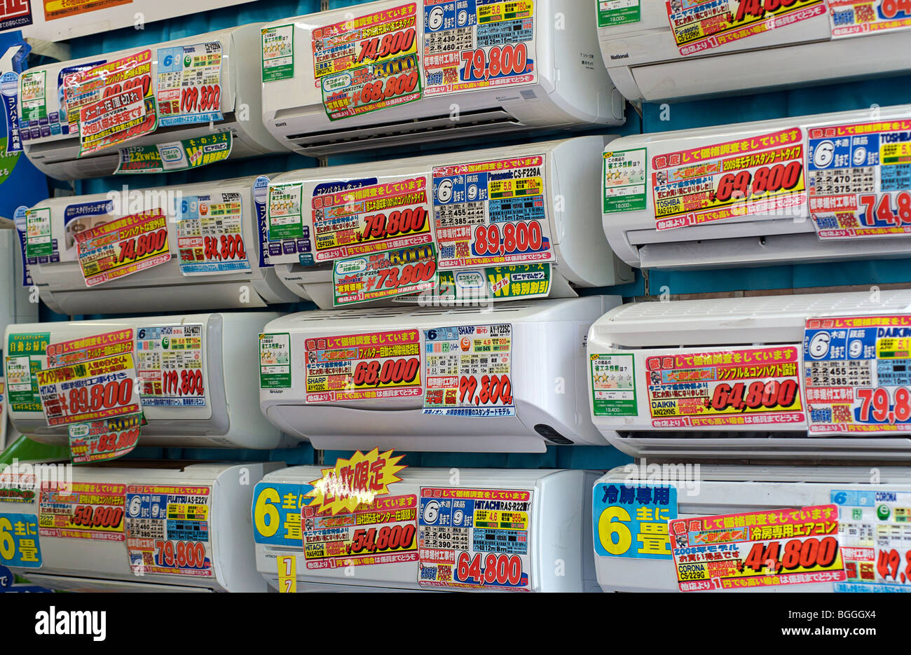 Air conditioning units for sale in an electrical store in Japan Stock ...