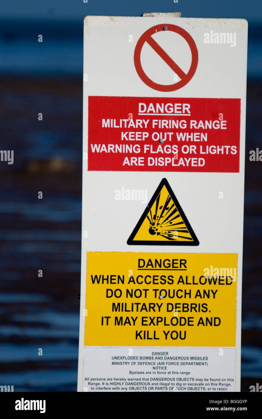 A warning sign on a sand bar at Donna Nook, Lincolnshire England, UK ...