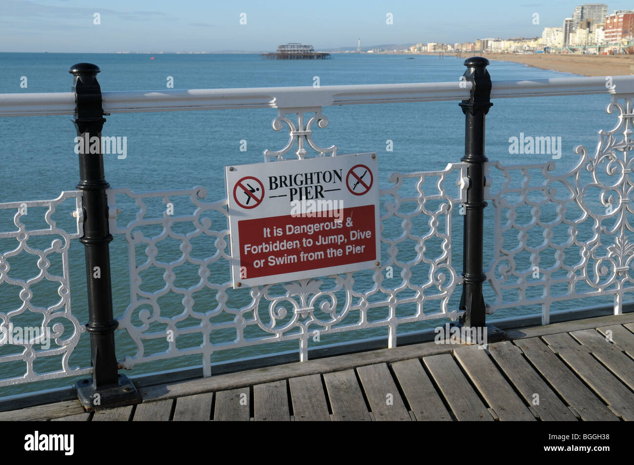 Warning sign on Brighton Pier Stock Photo - Alamy
