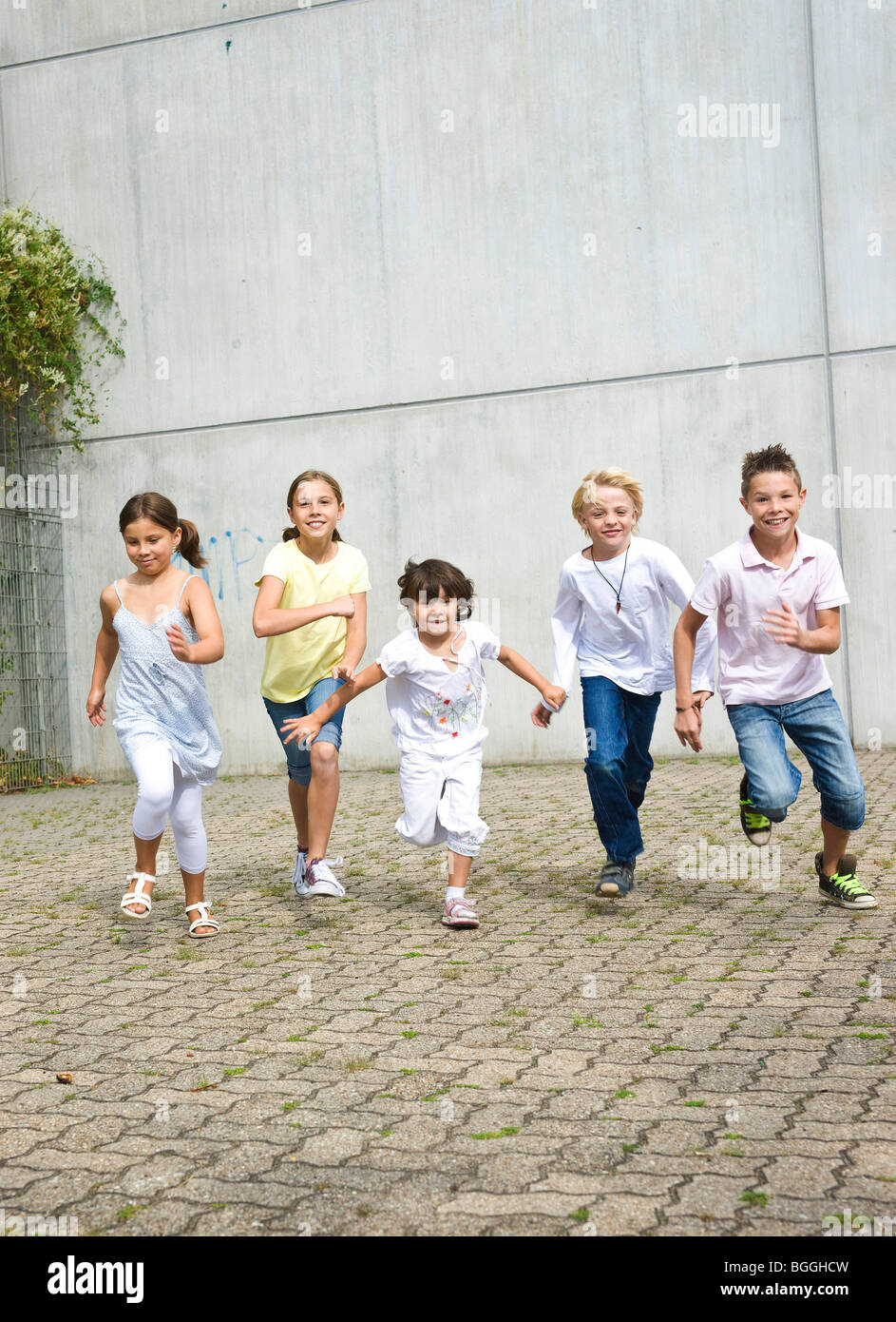 Children running towards camera hi-res stock photography and images - Alamy