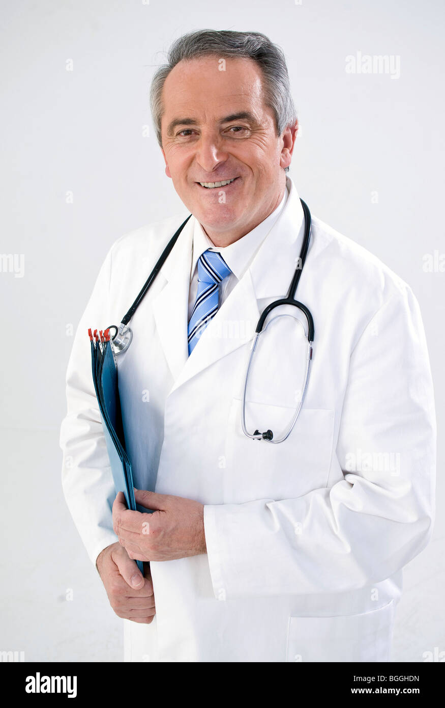 Doctor smiling at the camera, portrait Stock Photo - Alamy