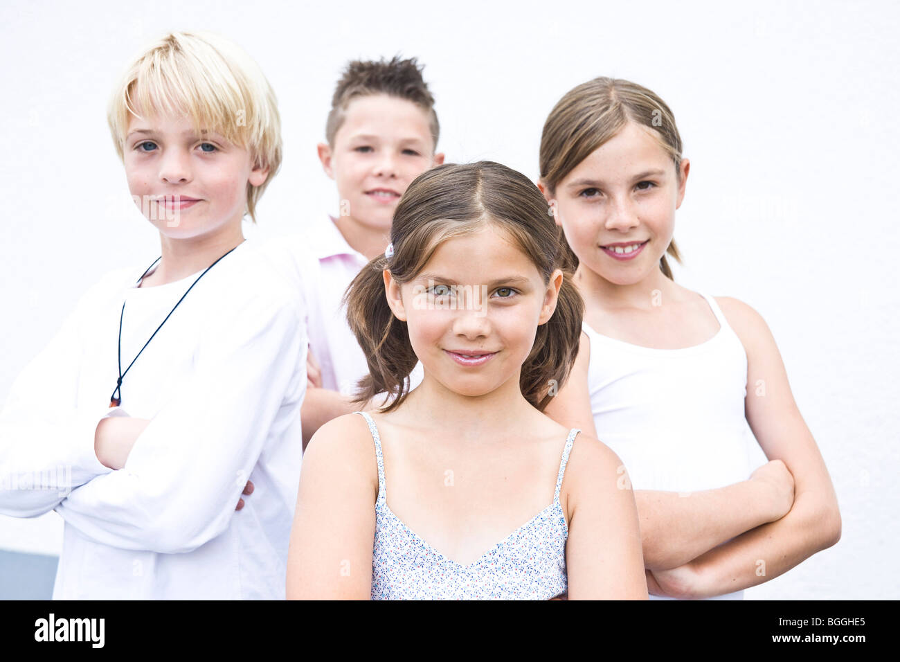 Four children, portrait, front view Stock Photo - Alamy