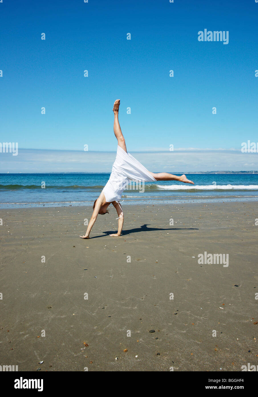 You woman doing a cartwheel hi-res stock photography and images - Alamy