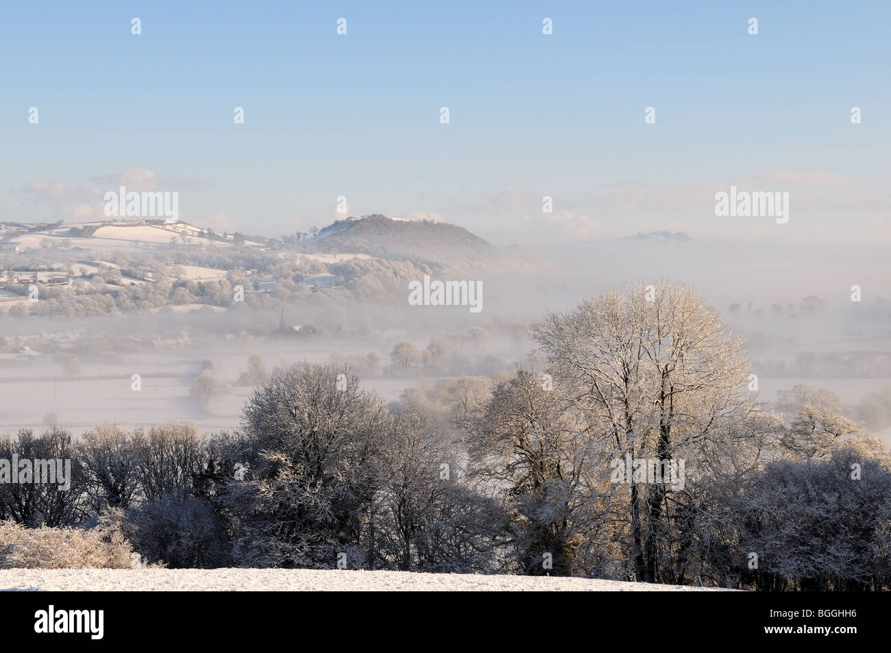 Misty snowy morning view over the Tywi Valley toward Merlins Hill Iron ...