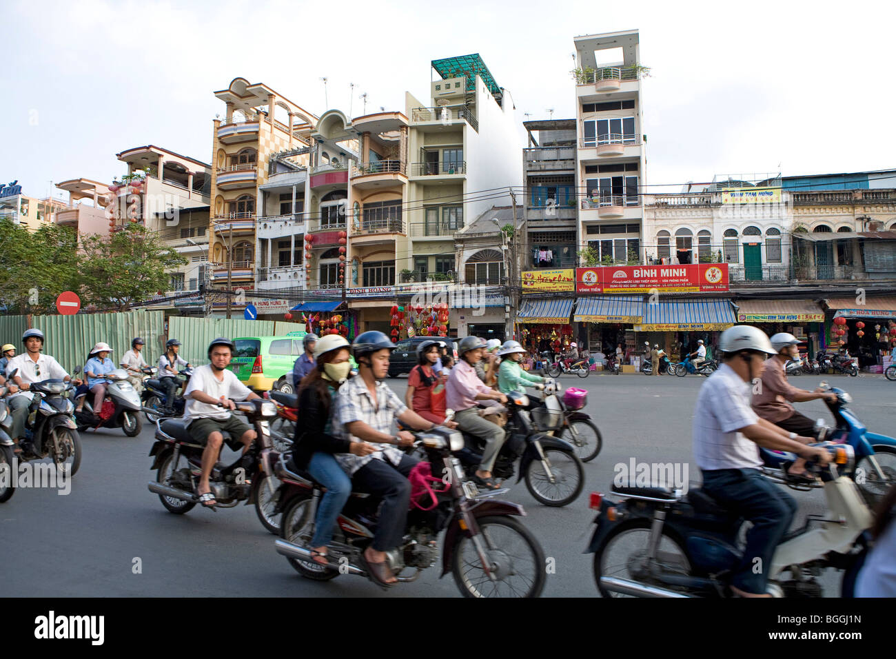 Moped drivers on a street in ho chi minh city hi-res stock photography ...