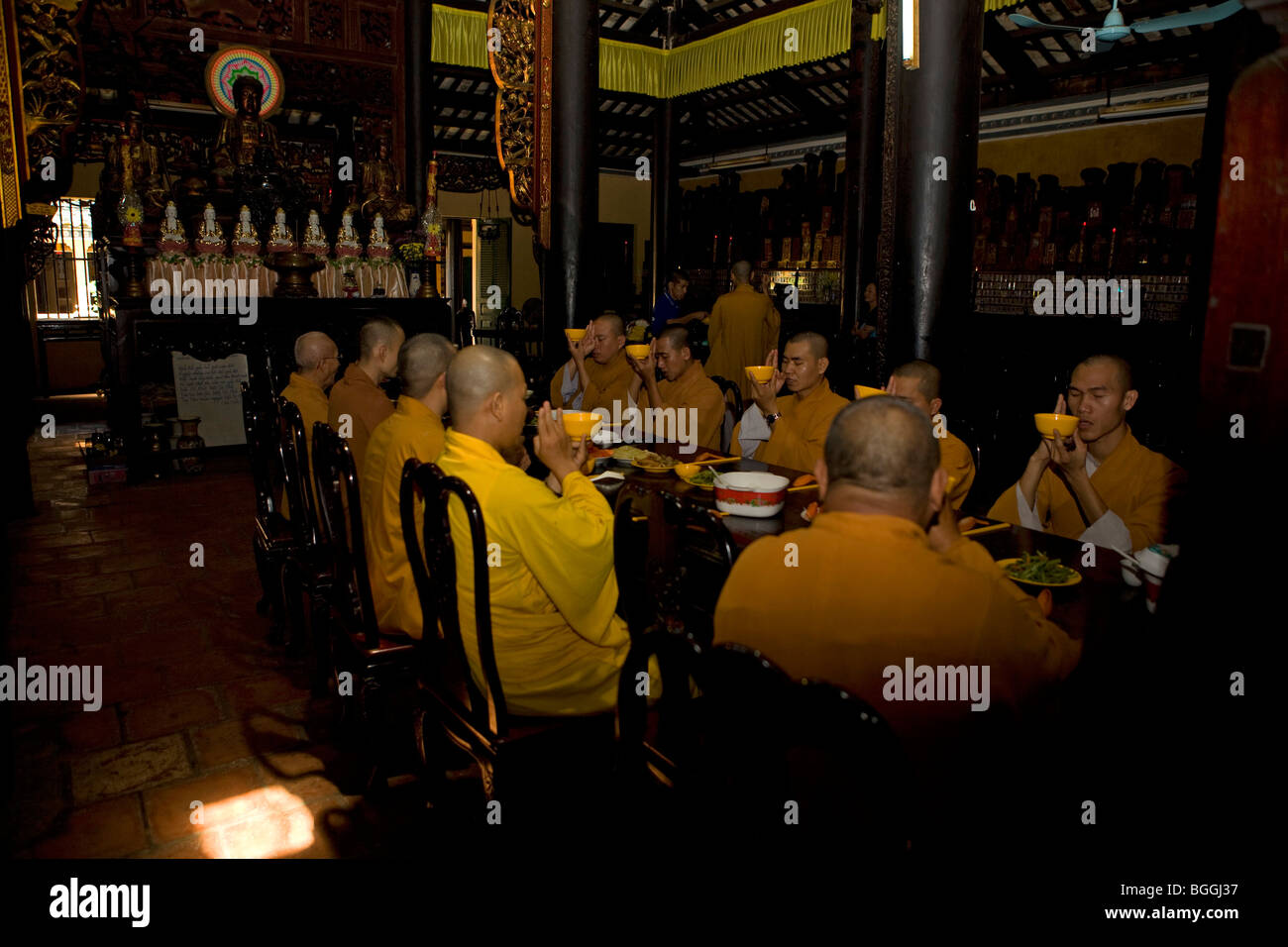 Monks sitting at a dining table hi-res stock photography and images - Alamy