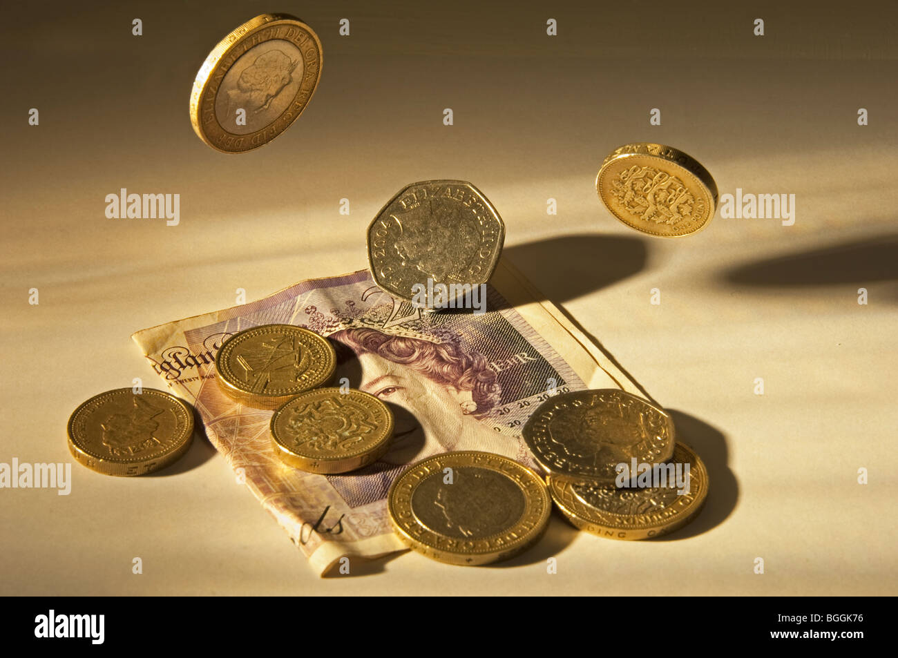 Shadows, coins, Banknotes, English Stock Photo - Alamy