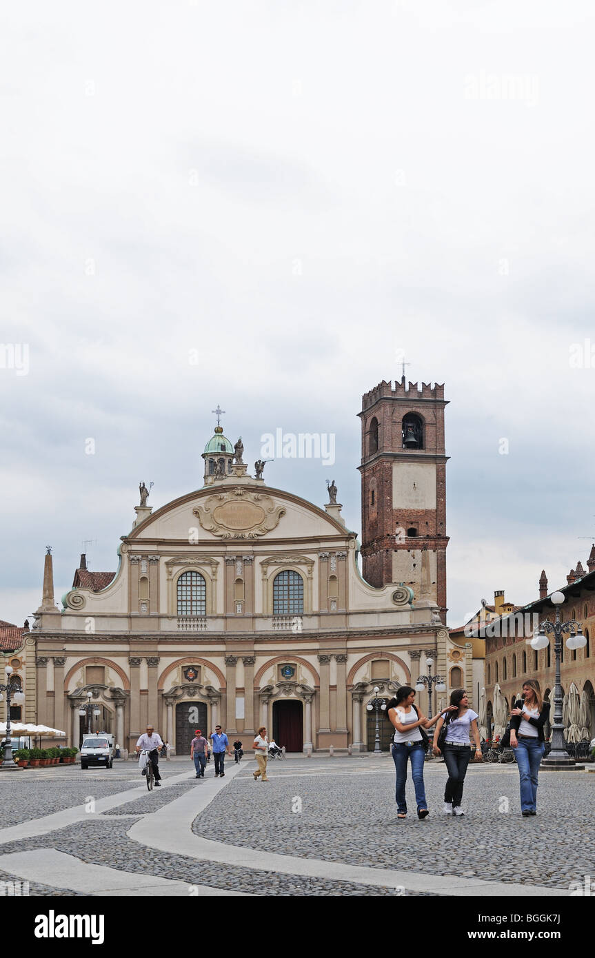 Young women walking in Piazza Ducale Vigevano Italy with 17TH century ...