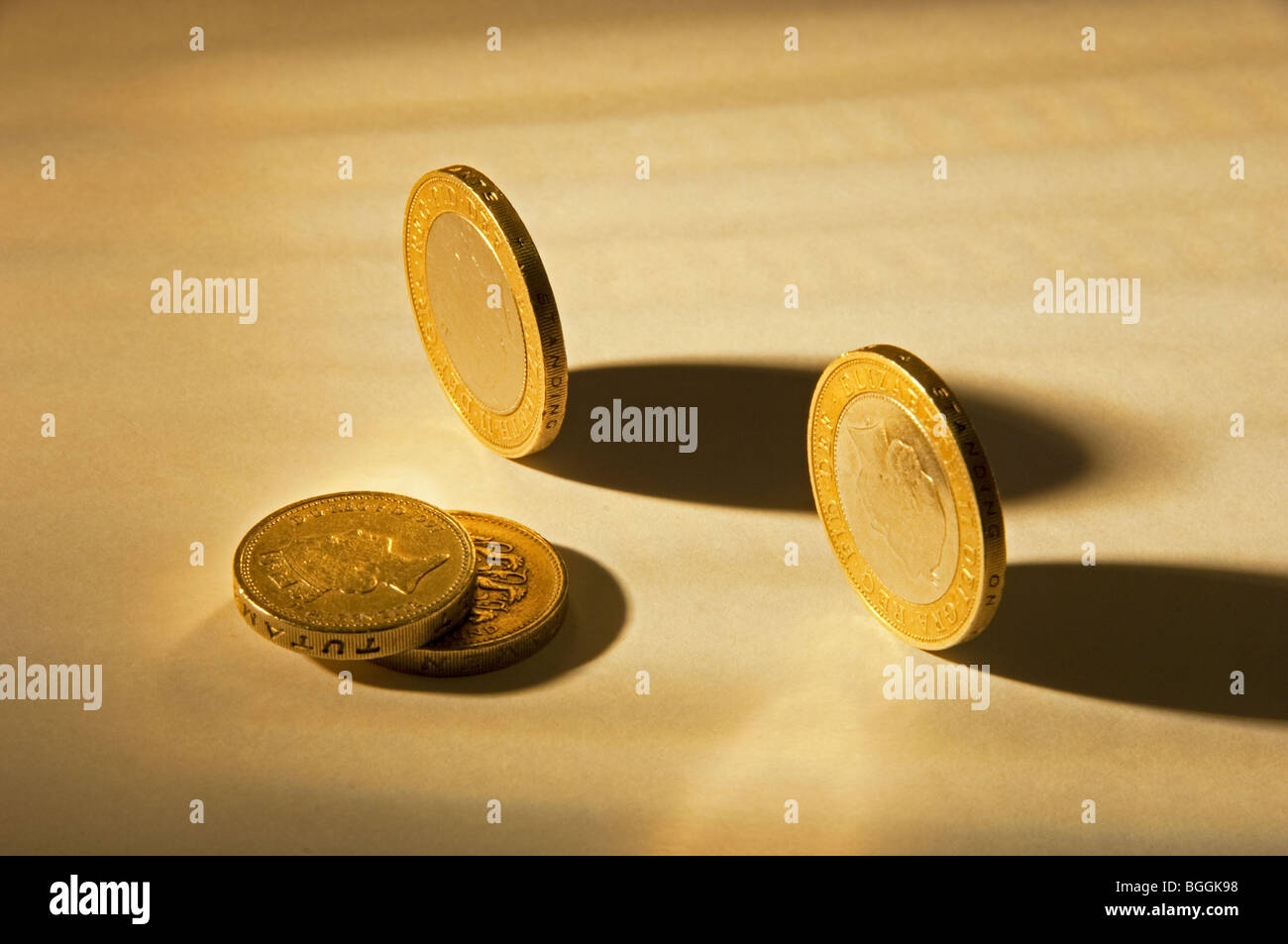 Shadows, coins, English, Scottish Stock Photo - Alamy
