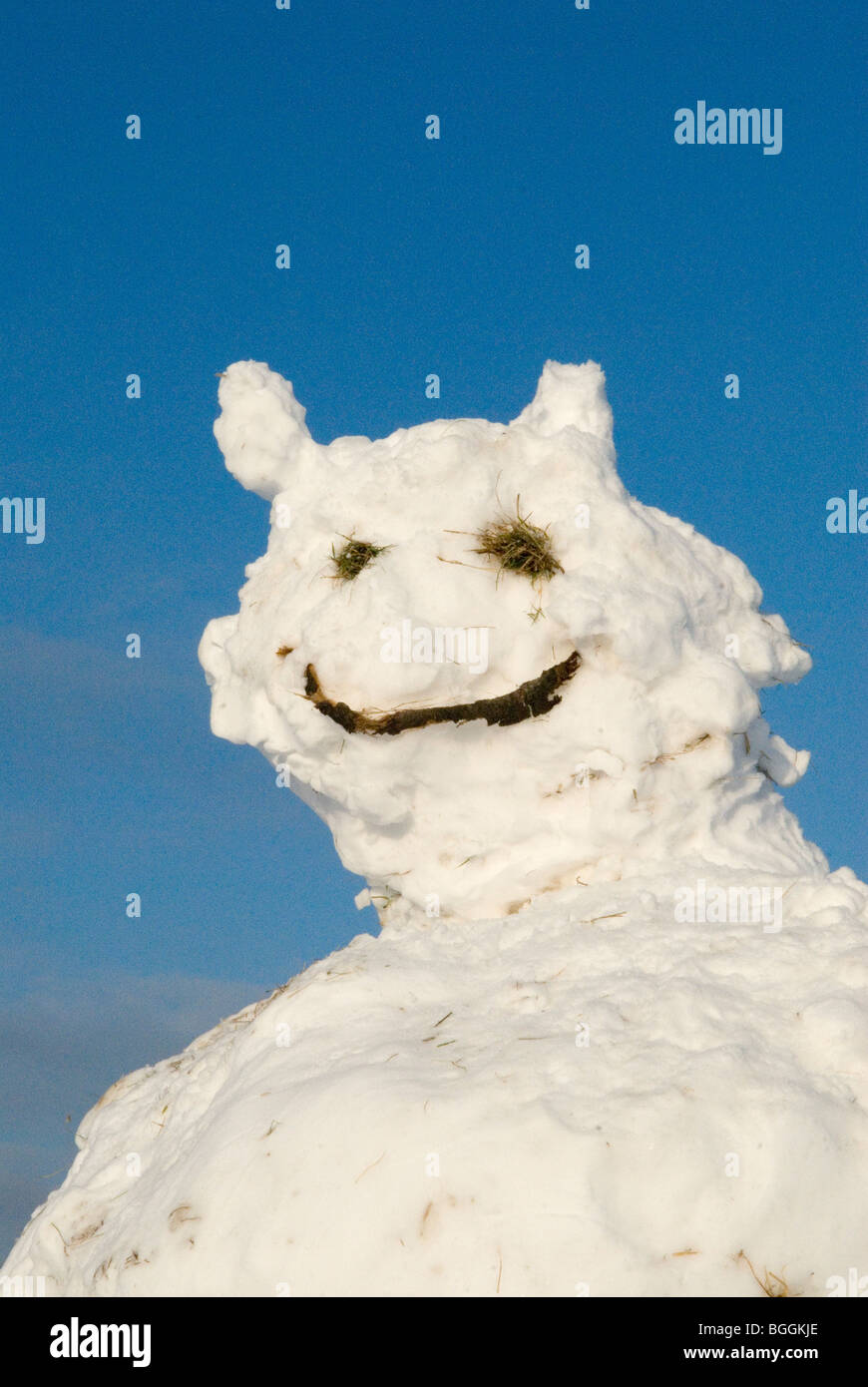Snow Man UK. Blue sky real snowman nobody happy smiling face 2010 2010s ...