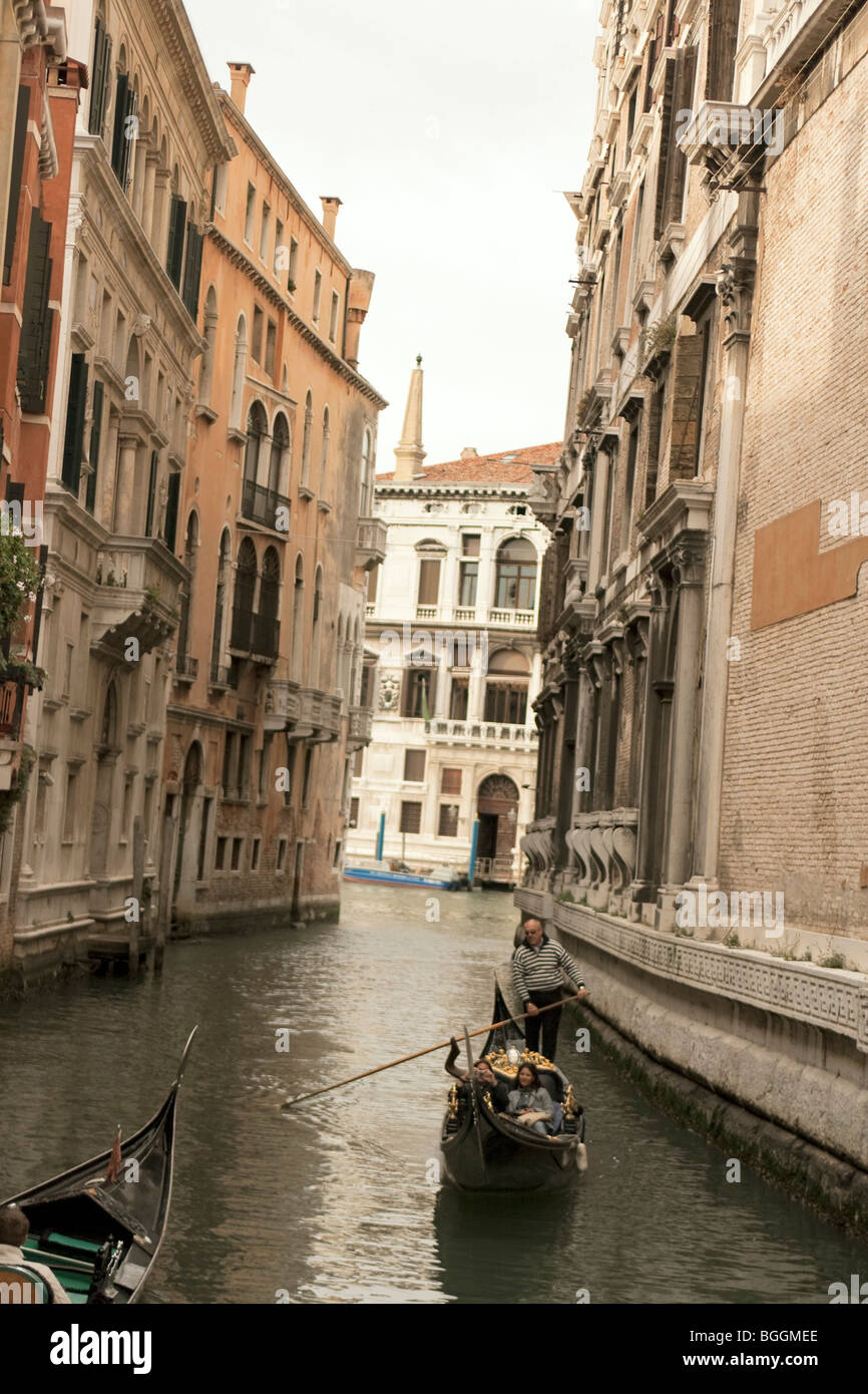 Gondolas on narrow canal, Venice, Italy, vanishing point Stock Photo ...