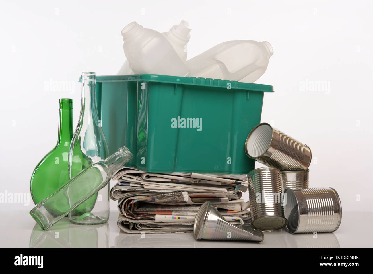 A collection of materials for recycling shot against a white background ...