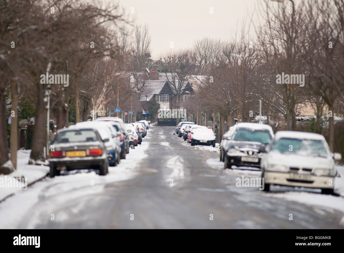 Ice covered London street with parked cars Stock Photo - Alamy