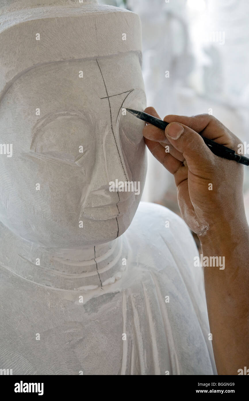 Working on a marble Buddha statue. Marble workshop. Mandalay. Myanmar ...
