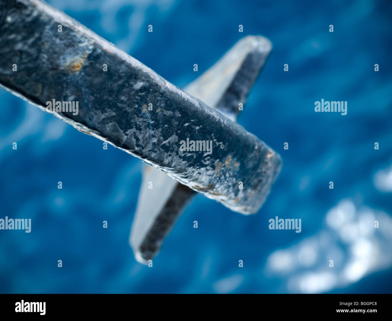 Arrowhead of the anchor on the sea background Stock Photo - Alamy