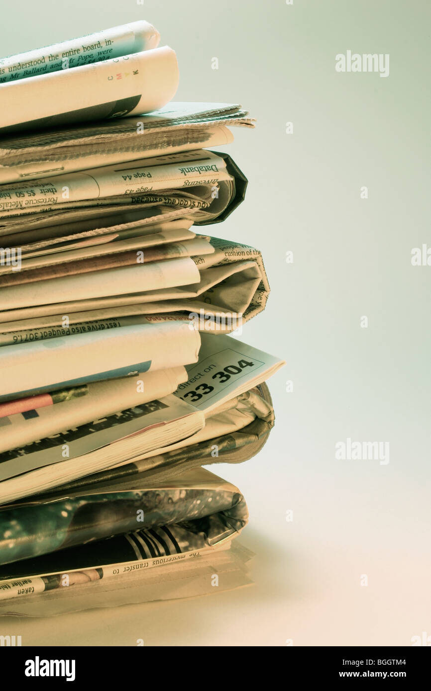 Stack of Newspapers Stock Photo - Alamy