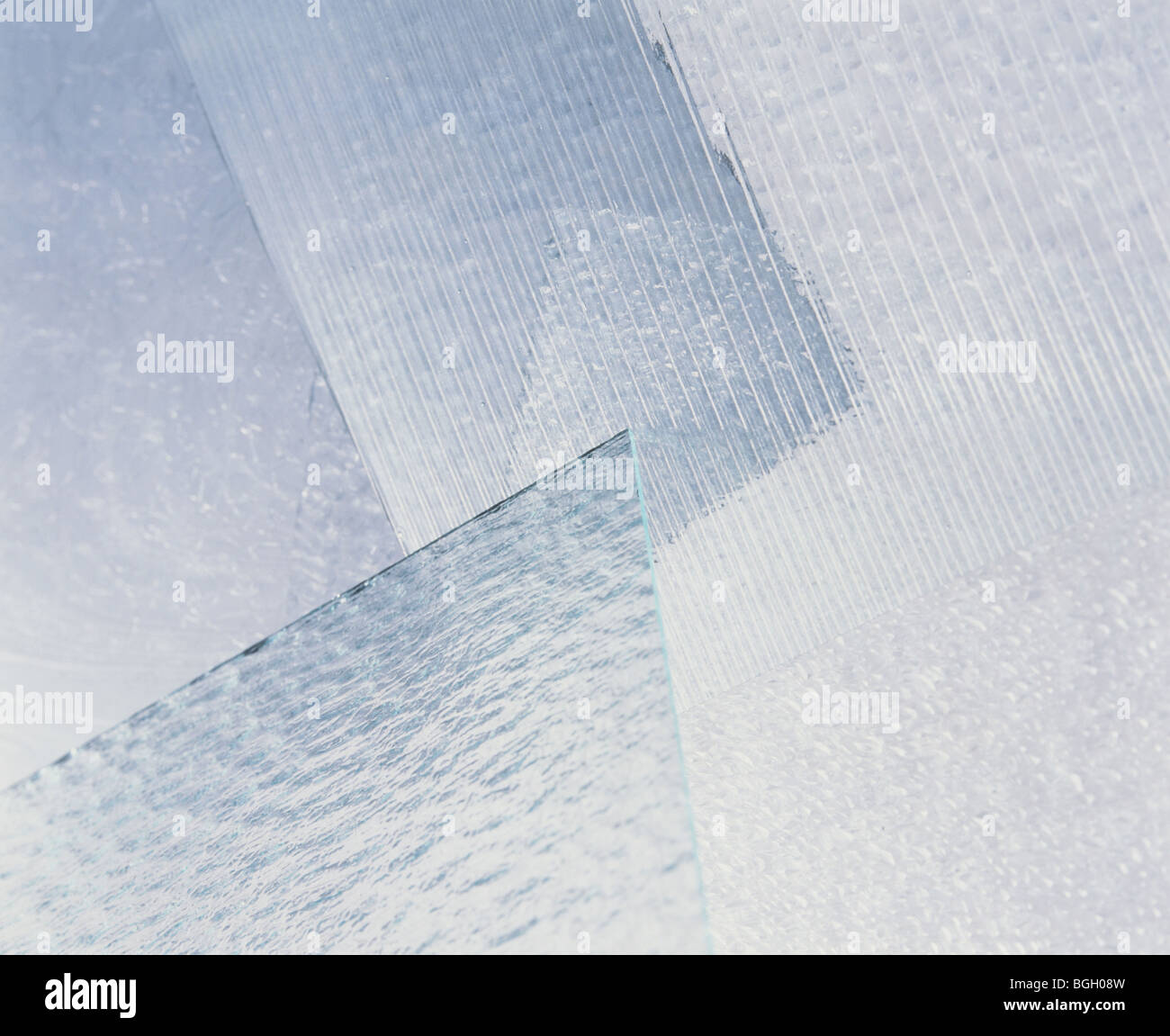 Overlapping sheets of glass Stock Photo - Alamy