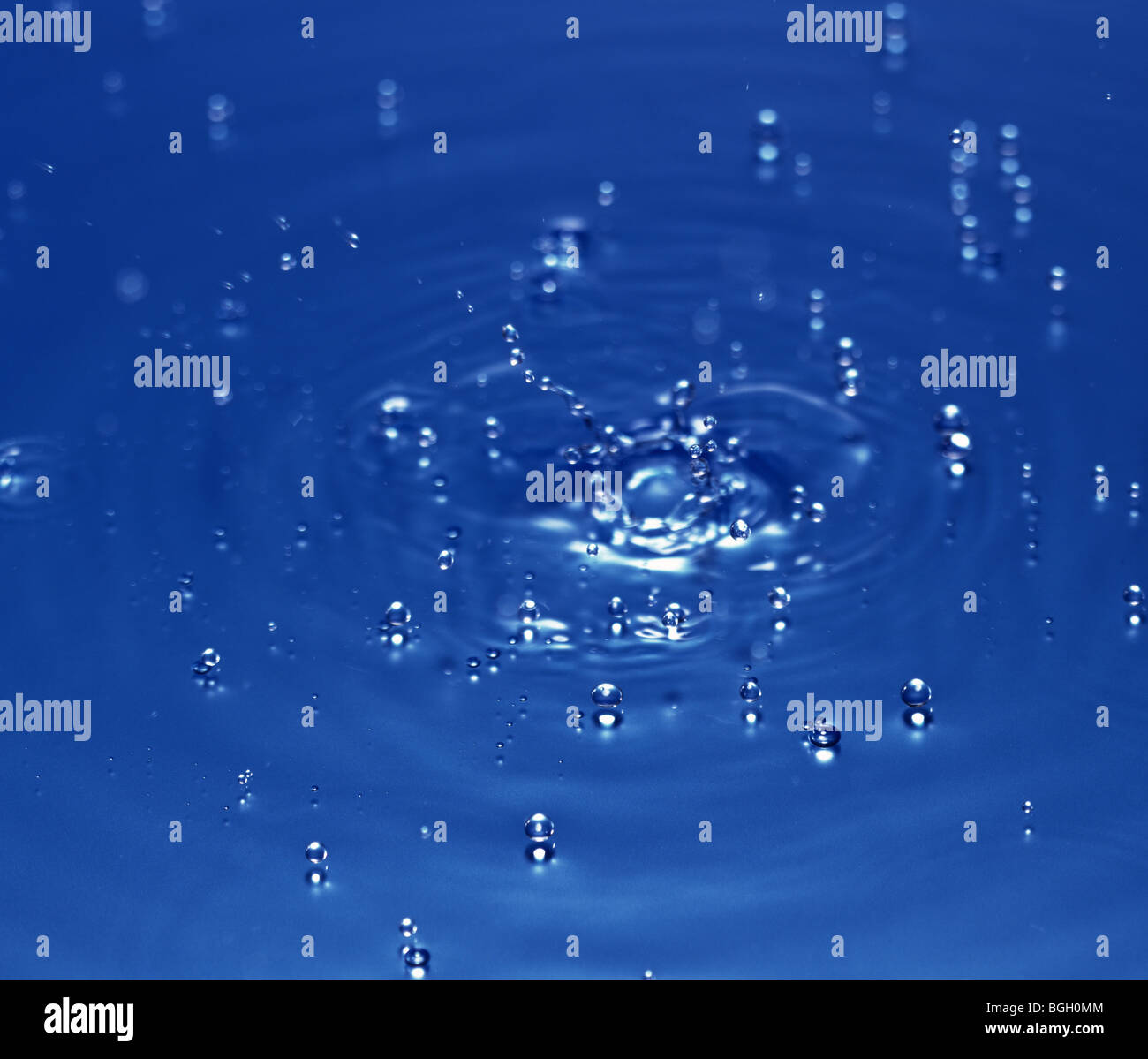 Drops of water falling Stock Photo - Alamy